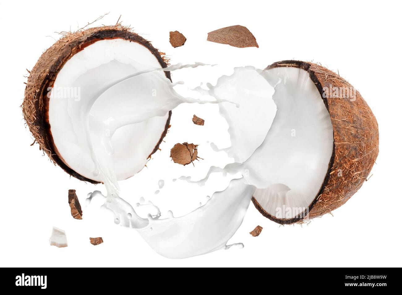 Broken coconut and splash of milk isolated on white Stock Photo - Alamy
