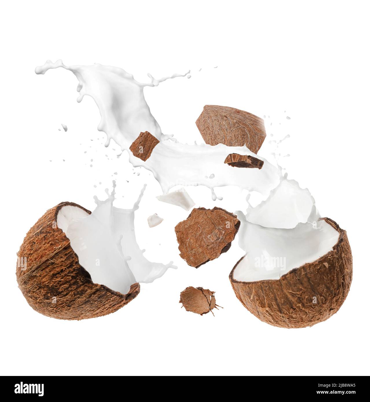 Broken coconut and splash of milk isolated on white Stock Photo - Alamy