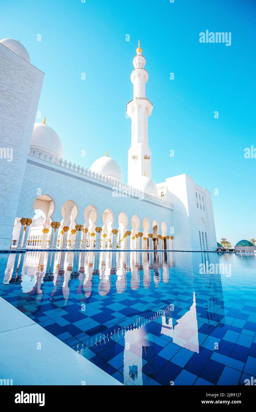 Sheikh Zayed Grand Mosque Minaret View With The Pool And Blue Sky Stock ...