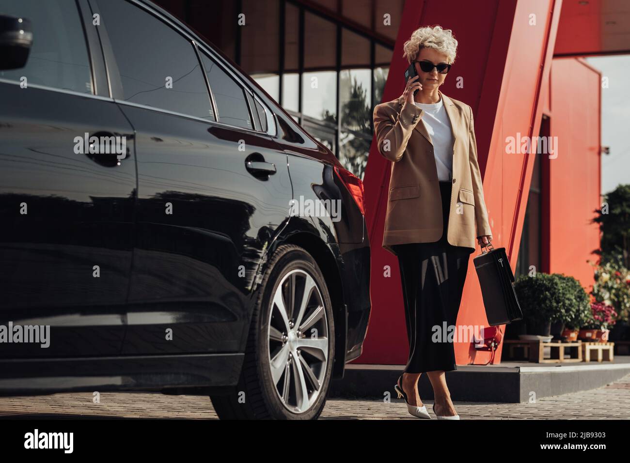 Road Accident Concept, Elegant Business Woman with Briefcase in Hand ...