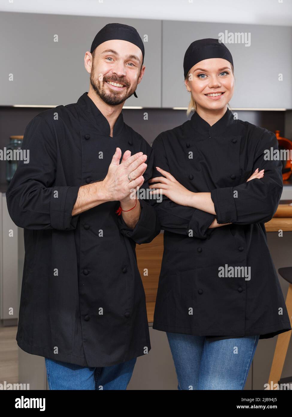 Two confident chefs Stock Photo - Alamy