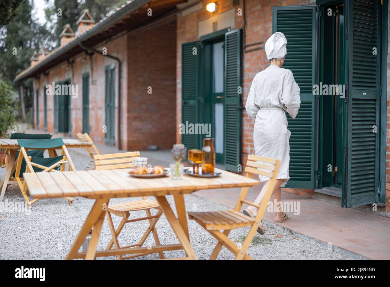 Woman carry food to table for breakfast at morning Stock Photo - Alamy
