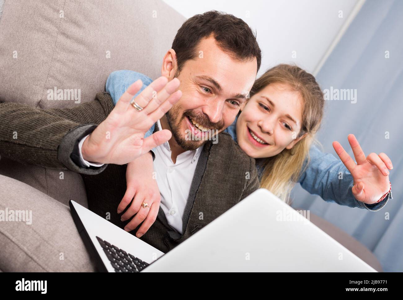 Father and daughter talking via Internet Stock Photo - Alamy