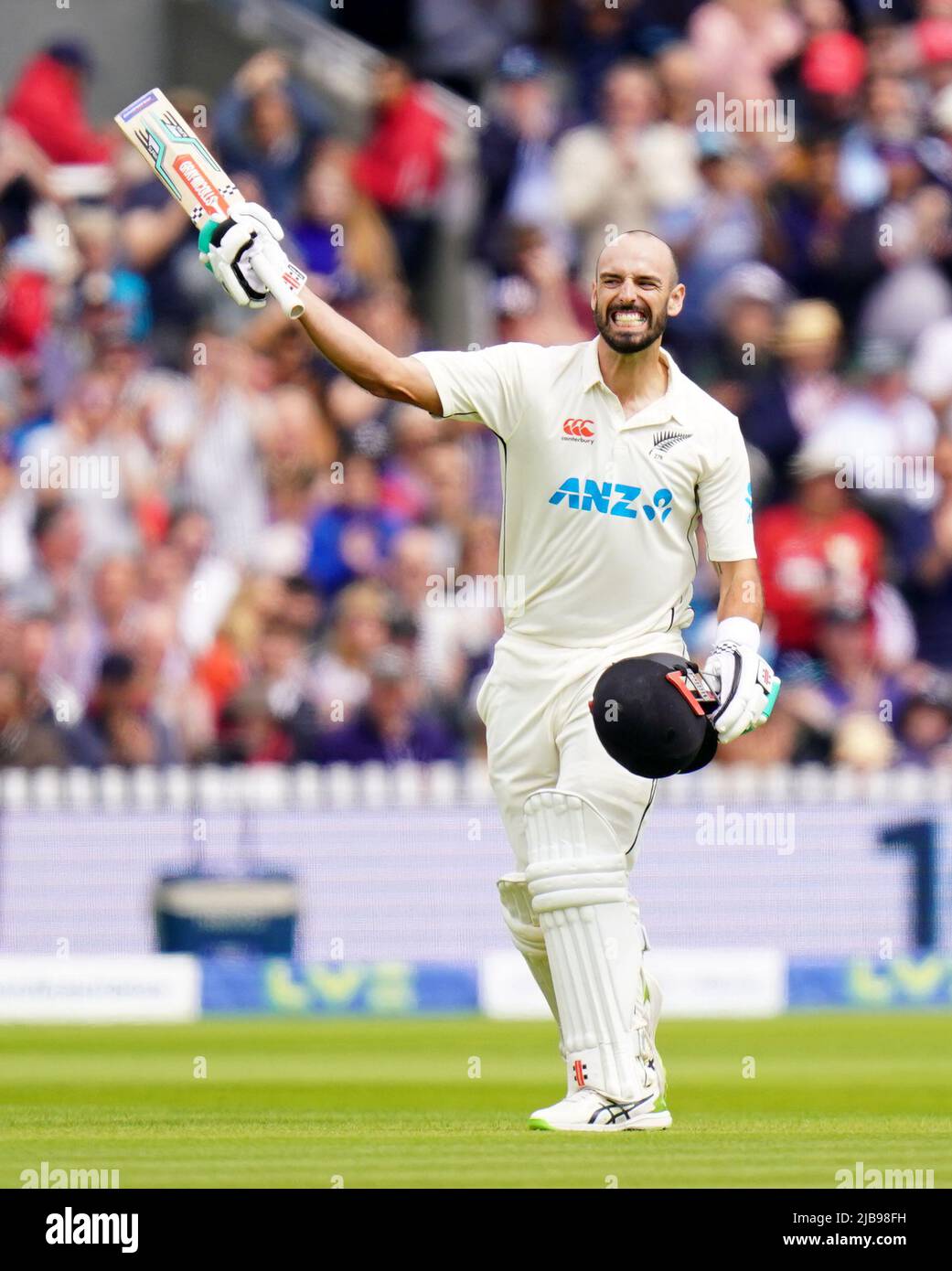 New Zealand's Daryl Mitchell celebrates reaching his hundred during day ...