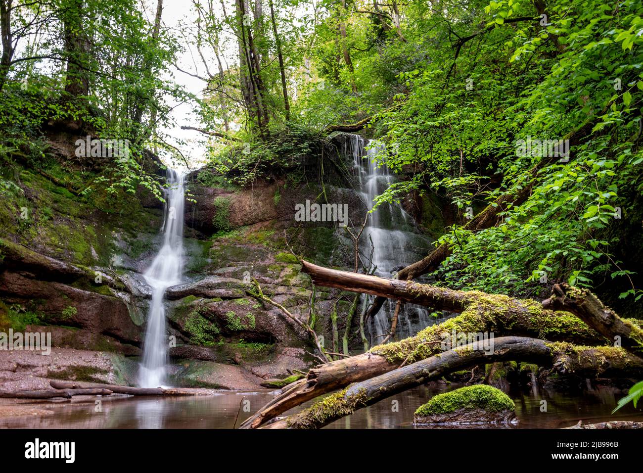 Brecon, May 15th 2022: A waterfall in Pwll Y Wrach Nature Reserve in ...