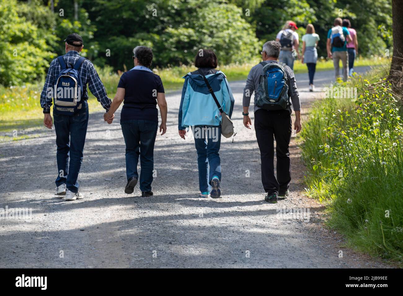 Dorfchemnitz, Germany. 04th June, 2022. Two couples are walking on a ...