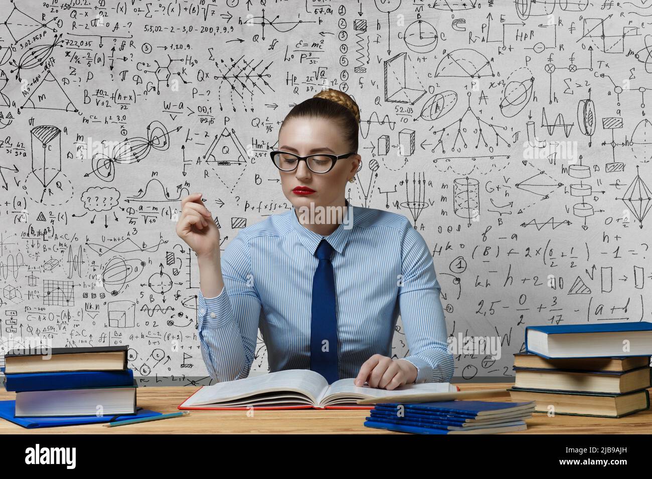 Strict female teacher . Mixed media Stock Photo - Alamy