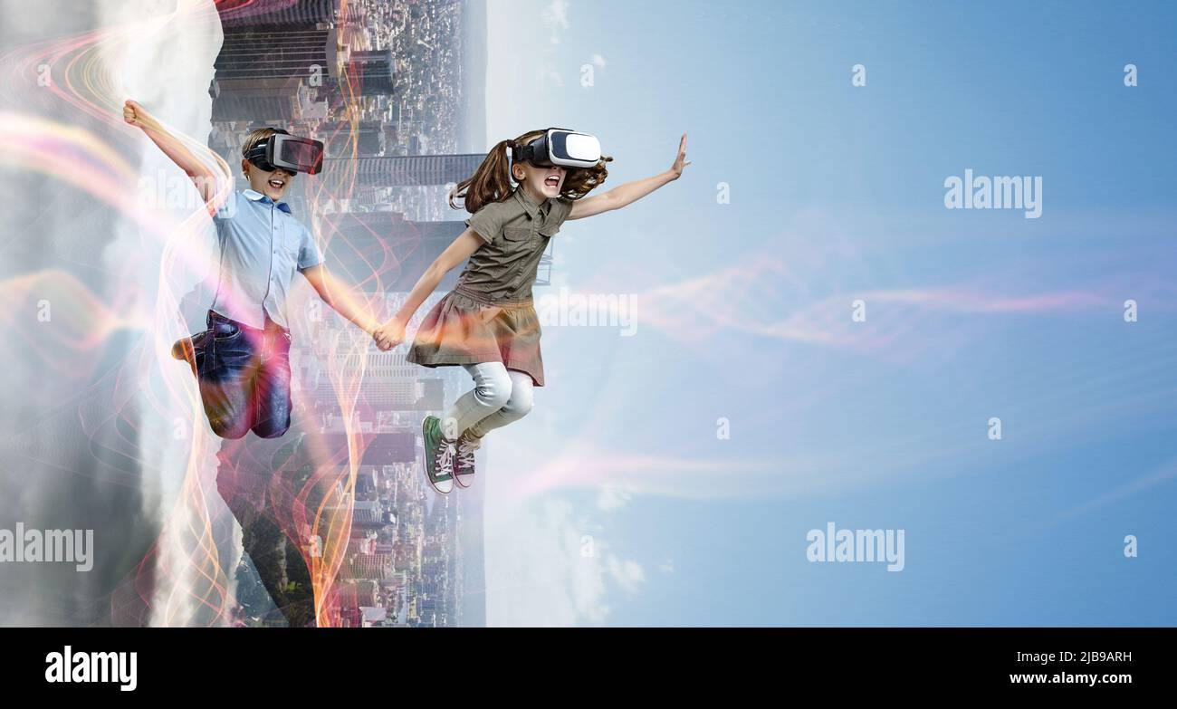 Kids wearing virtual reality goggles Stock Photo - Alamy
