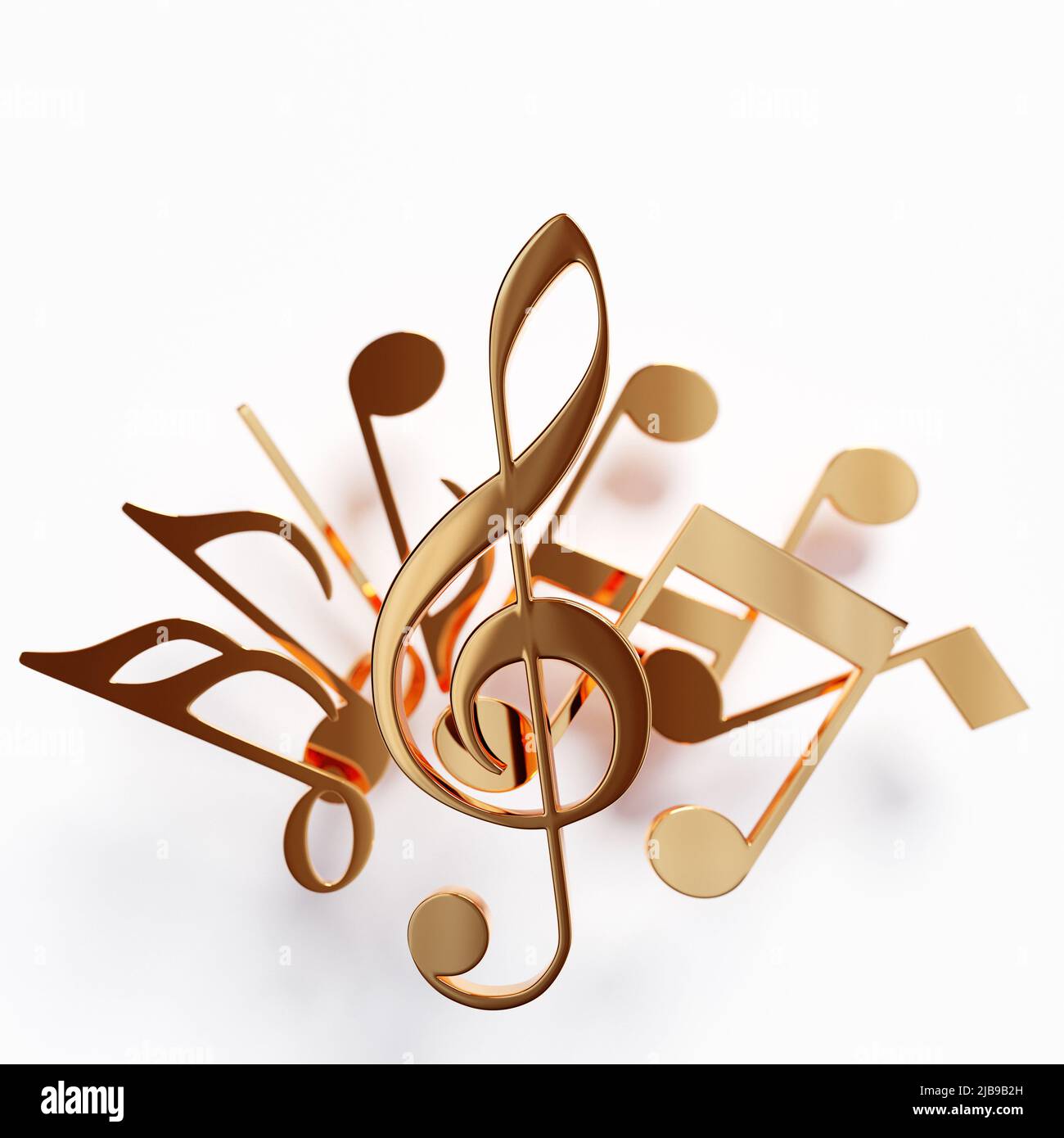 Realistic golden metal treble cle and musical notes on a white ...