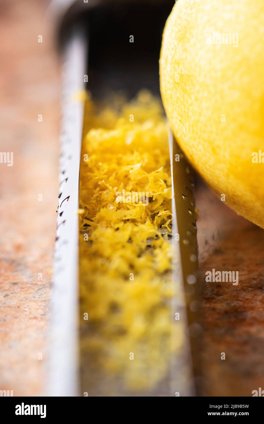 Fresh lemon zest from zester. Macro photography, selected focus Stock ...