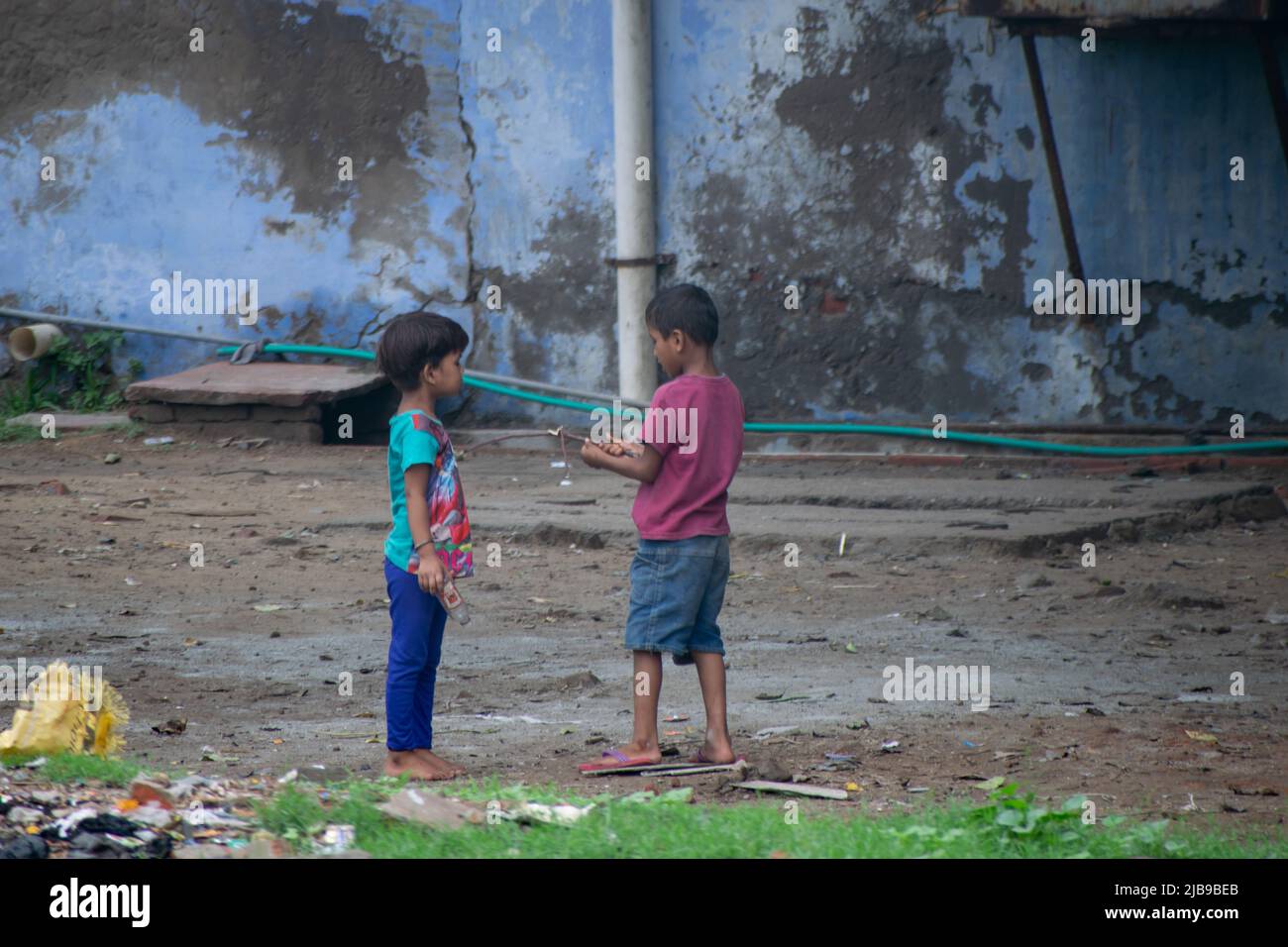 Kids playing in a ground near railway station Stock Photo - Alamy