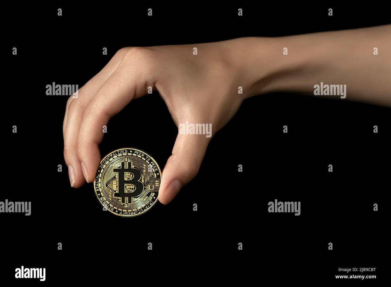 Coin holding human hand fingers hi-res stock photography and images - Alamy
