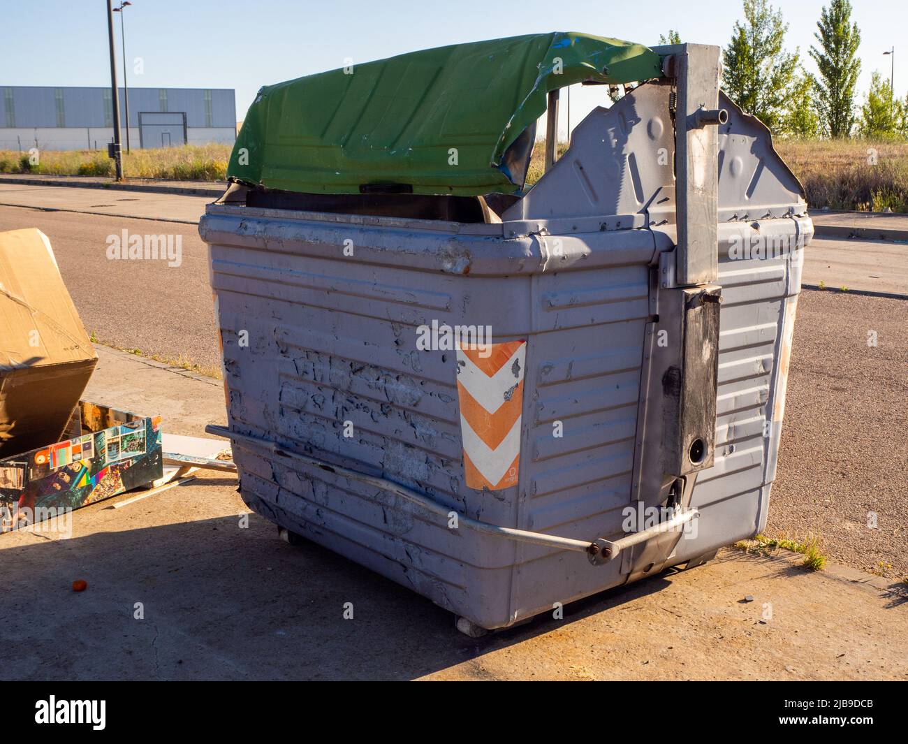 Overflowing garbage container on a street. Recycling concept. HQ image ...