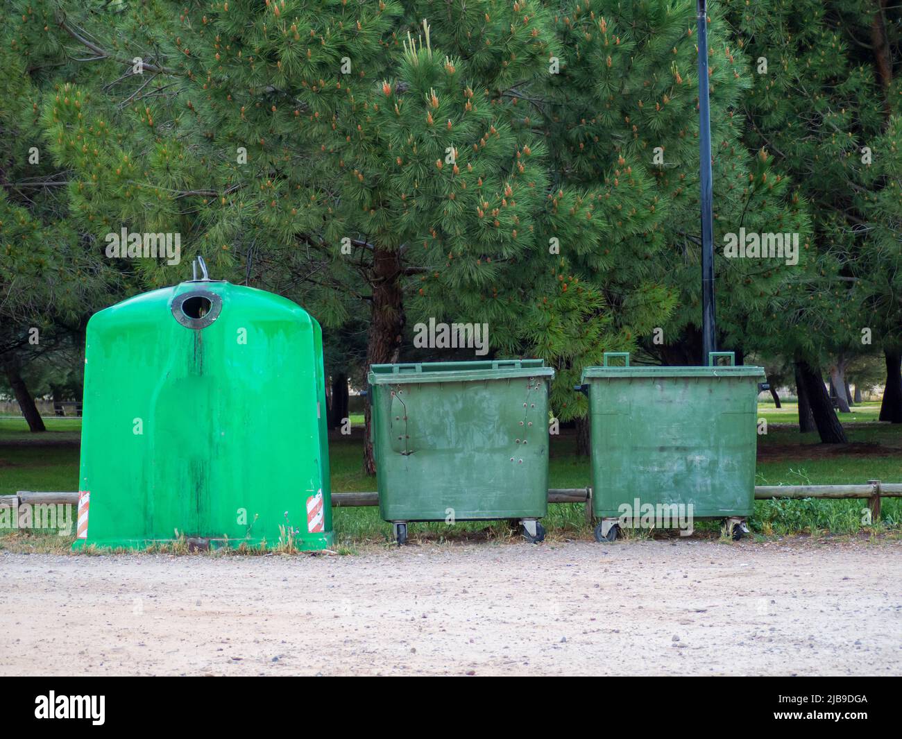 Green garbage containers in the city street. HQ image Stock Photo - Alamy