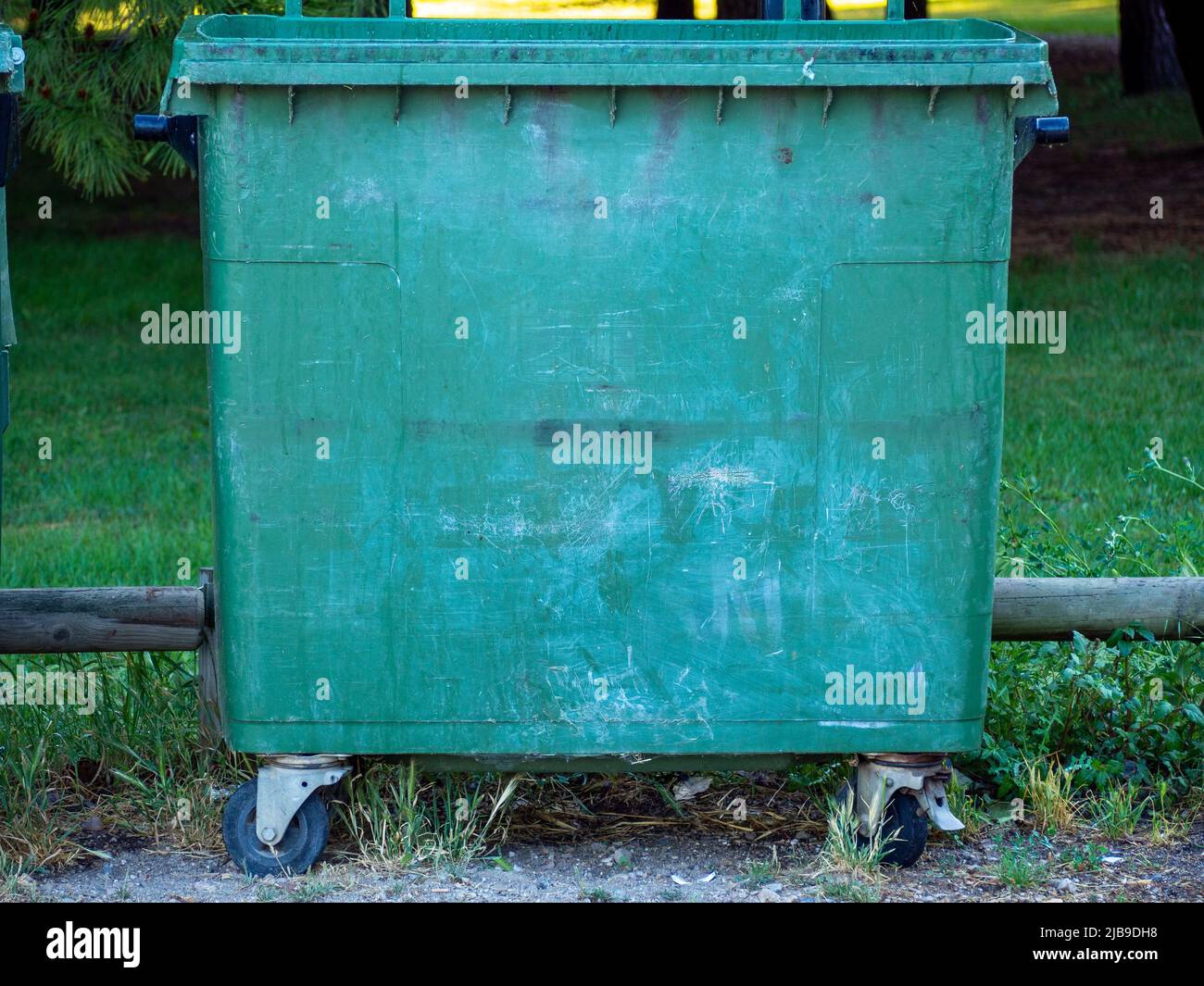 Green garbage containers in the city street. HQ image Stock Photo - Alamy