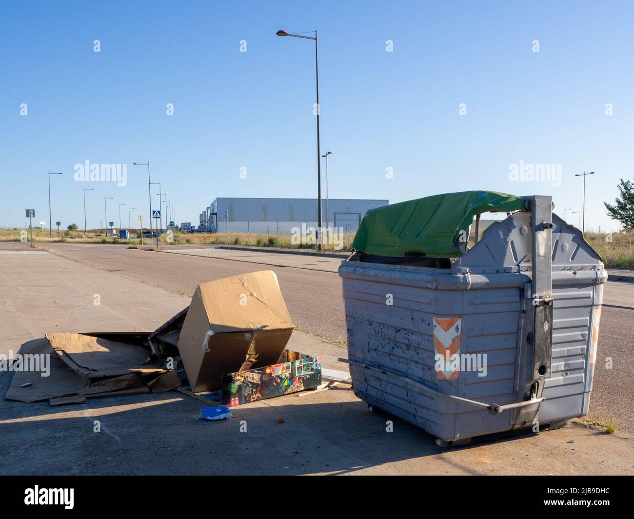 Green garbage containers in the city street. HQ image Stock Photo - Alamy