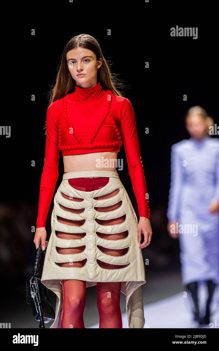 Antwerp, Belgium. 03rd June, 2022. A fashion model wearing clothes by master's degree student ...