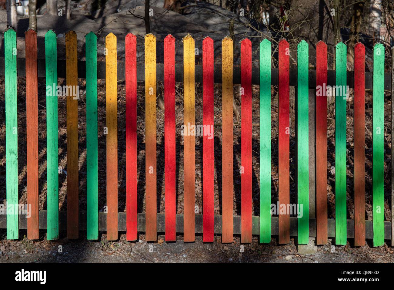 Colourful picket fence Stock Photo - Alamy