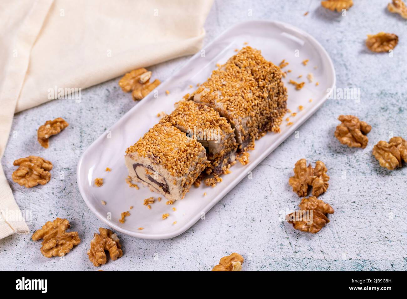 Palace halva. Traditional Turkish cuisine delicacies. Chocolate halva dessert on stone ...