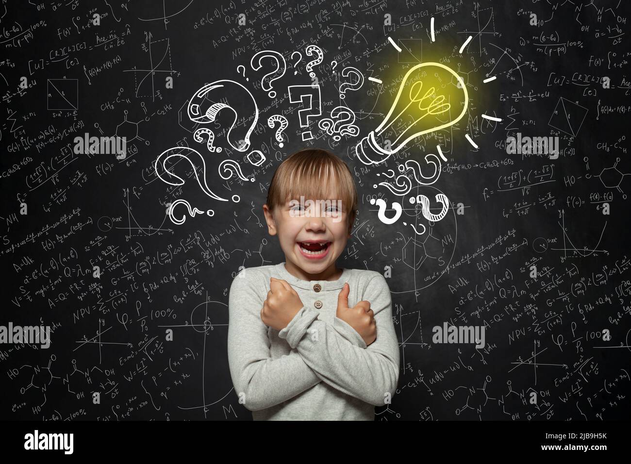 Child girl doing some maths exercises and get idea Stock Photo - Alamy