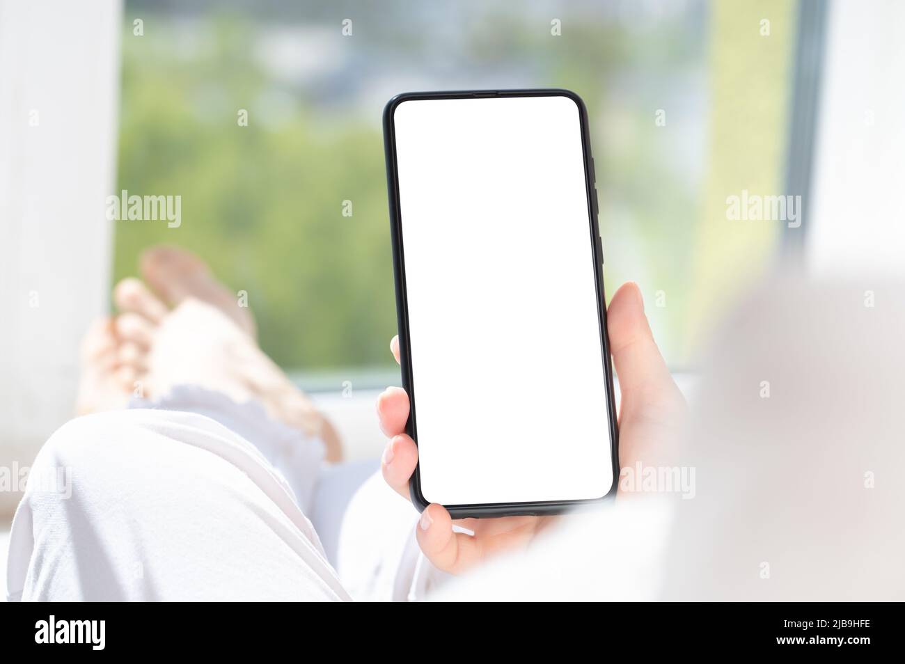 Mockup cellphone. Cropped shot view of woman hands holding smart phone ...