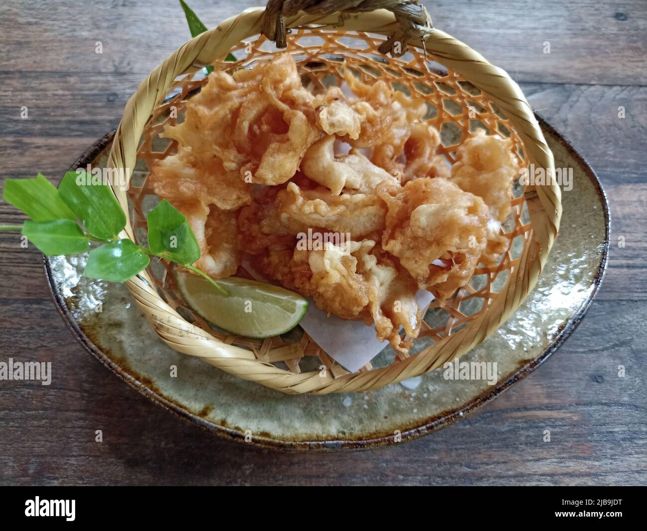 deep fried crispy squid cuttlefish with lemon Stock Photo - Alamy