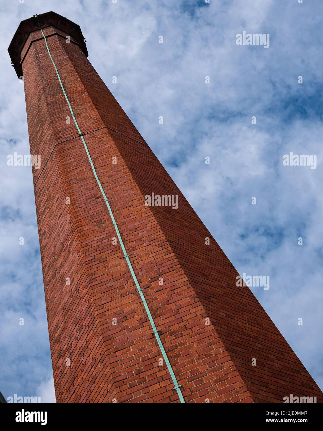 Close Up of Tall Red Brick Industrial Chimney Against Skyline ...