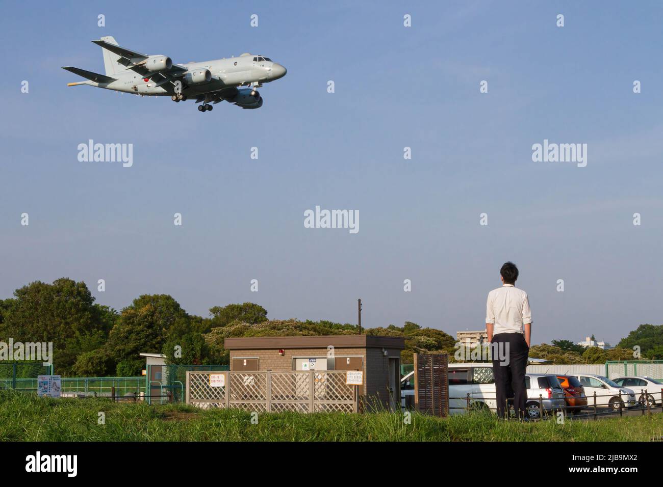 A military aircraft enthusiast watches a Kawasaki P1 Maritime patrol ...