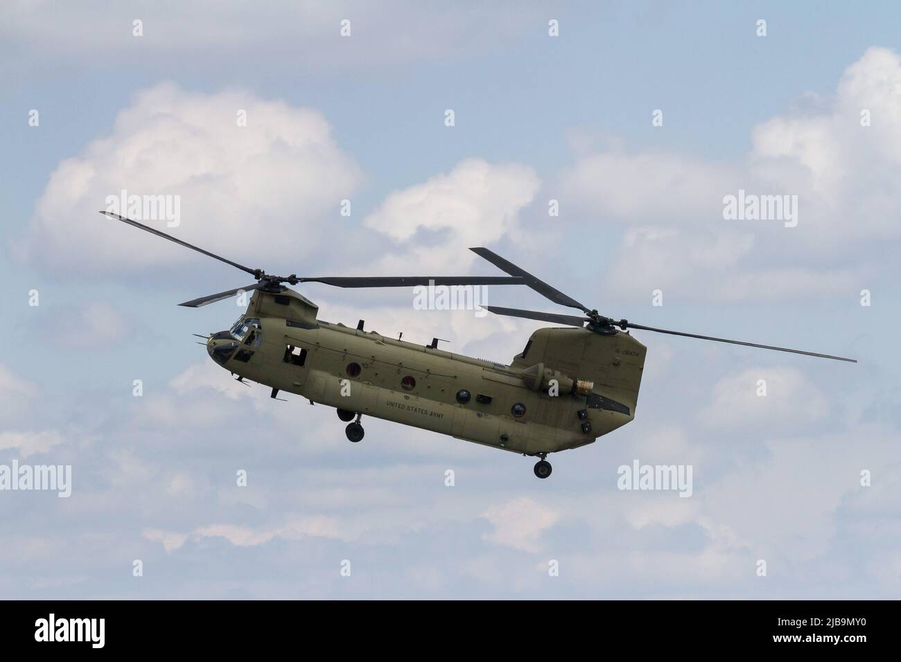 A Boeing CH 47 Chinook helicopter with the United Army flying at Yokota ...