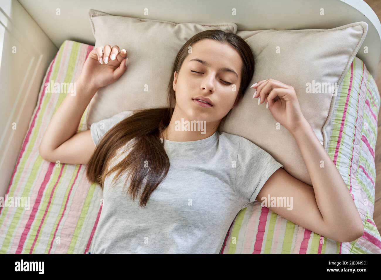 Teenage Girl Sleeping At Home In Bed Calm Peaceful Female Teenager