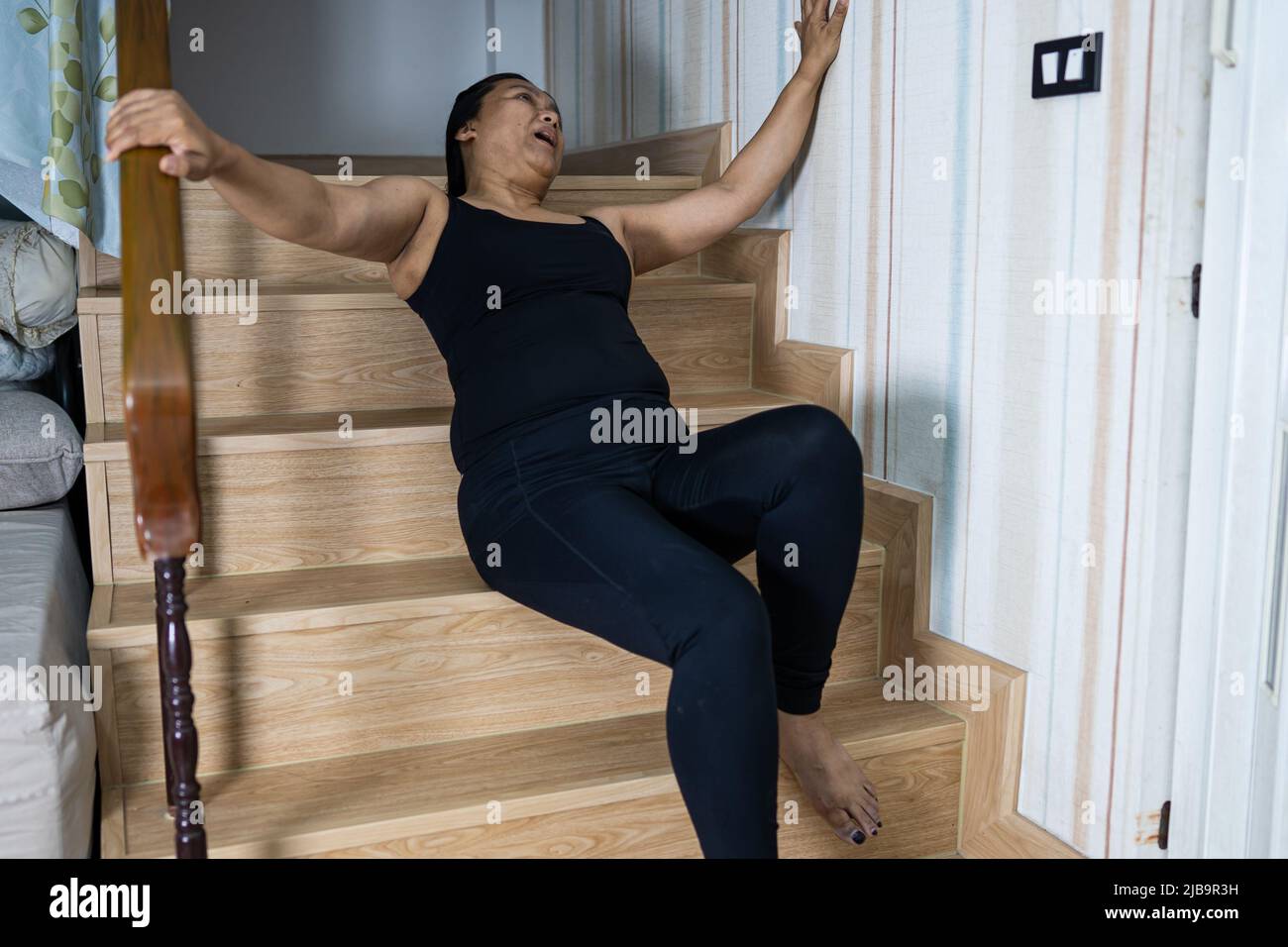 Asian lady woman patient fall down the stairs because slippery surfaces ...