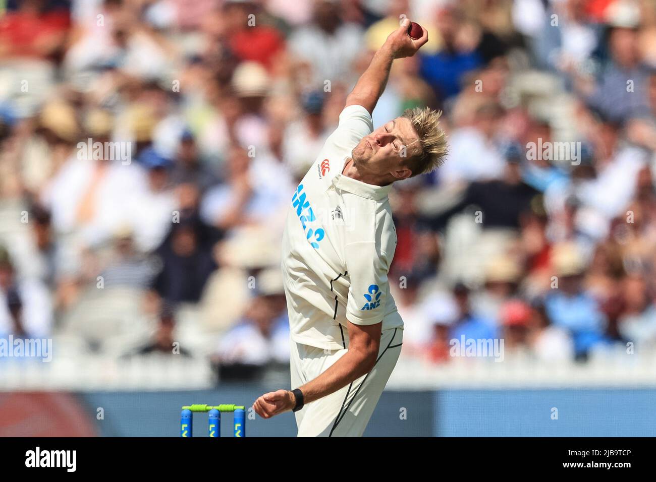 Kyle Jamieson of New Zealand, eyes closed as he delivers a ball Stock ...