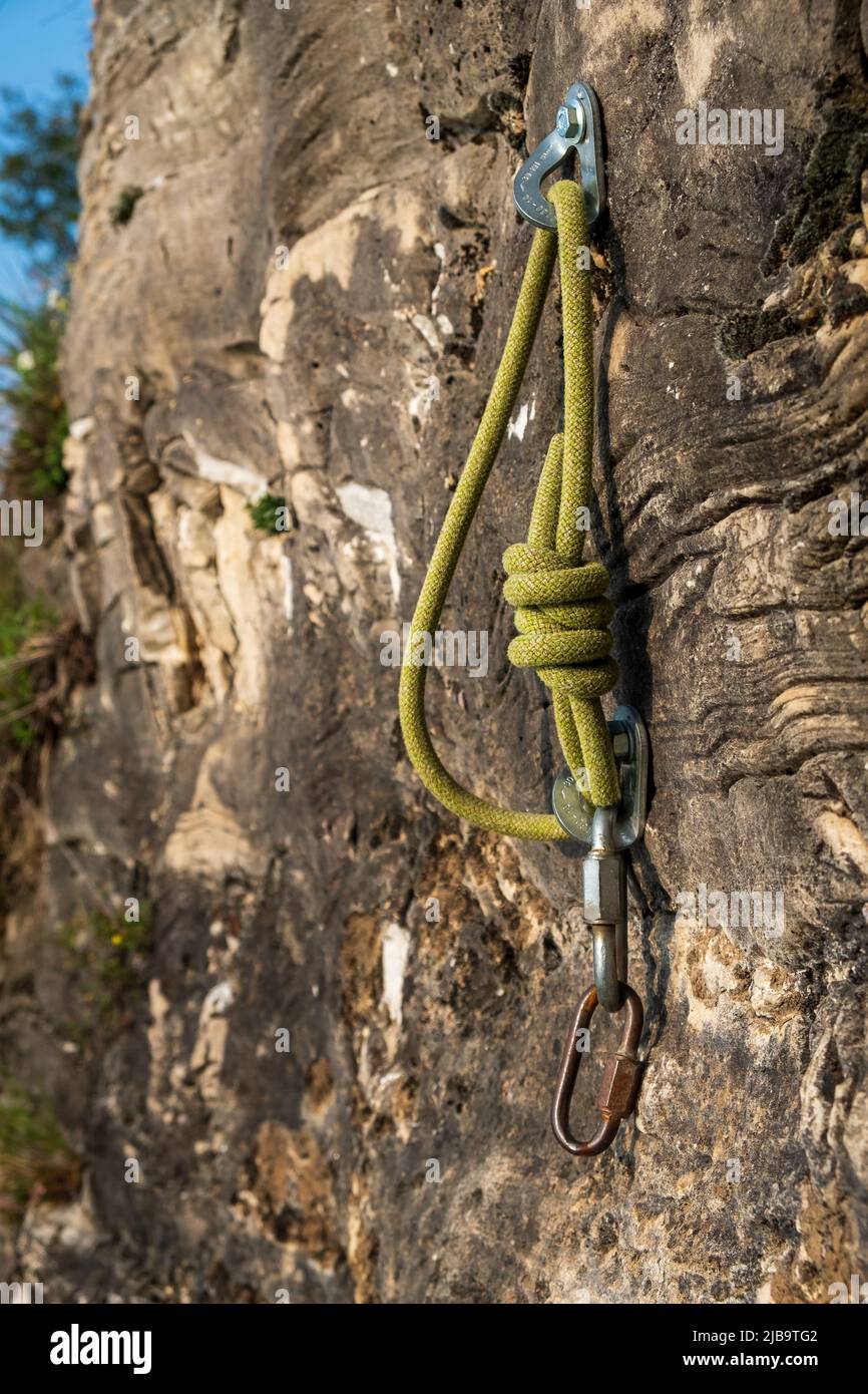 carbine hook rope stone Stock Photo - Alamy