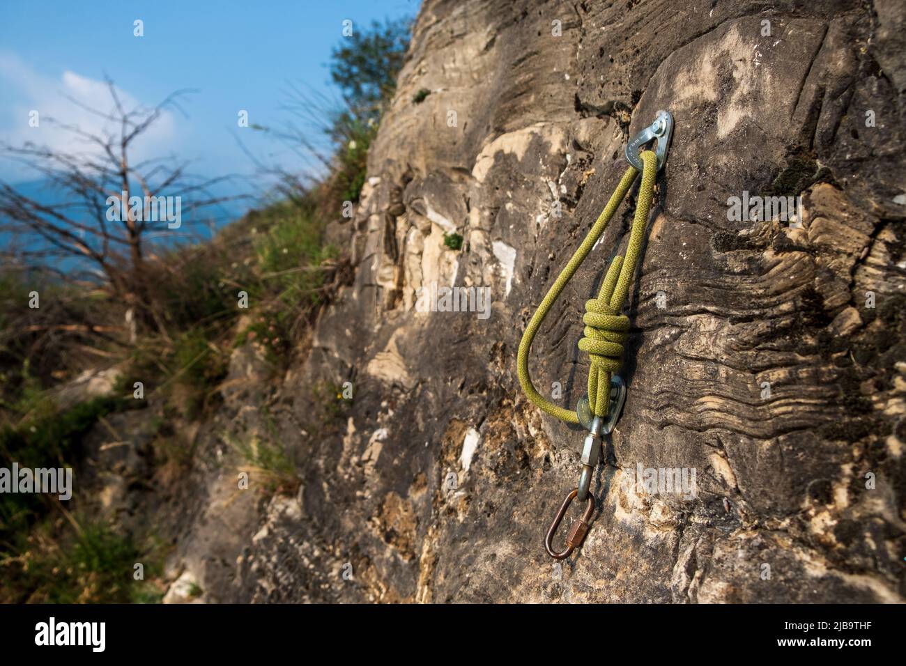 carbine hook rope stone Stock Photo - Alamy
