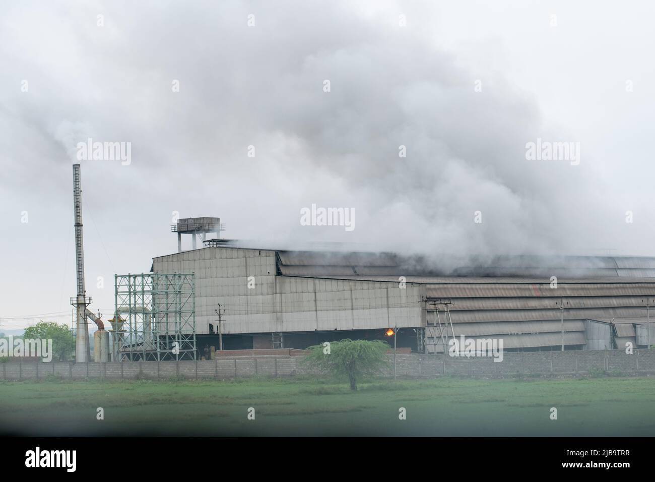Environment pollution due to factory , smoke is coming out of the ...