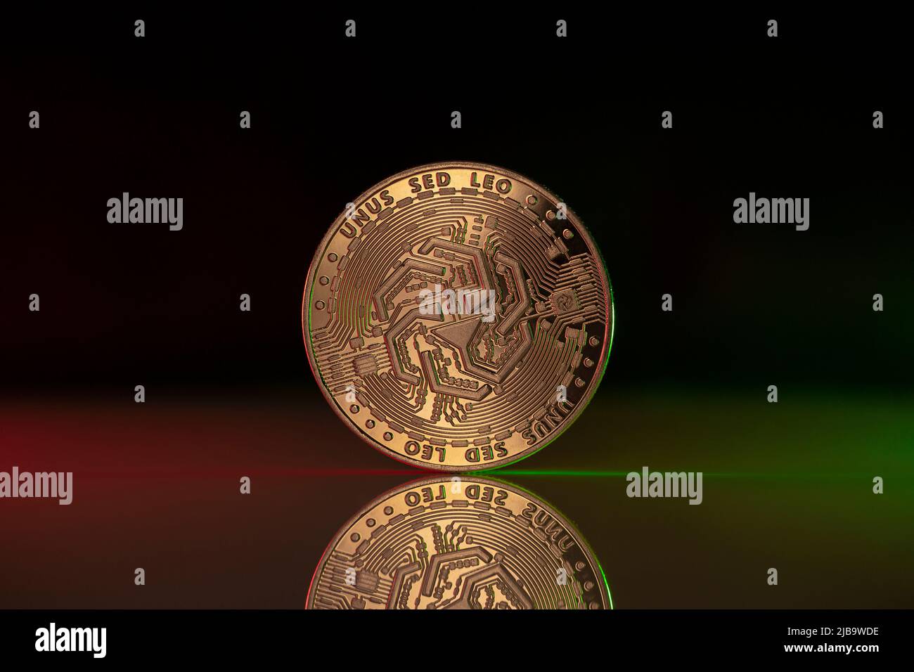 Unus Sed Leo Cryptocurrency Physical Coin Placed on reflective surface ...