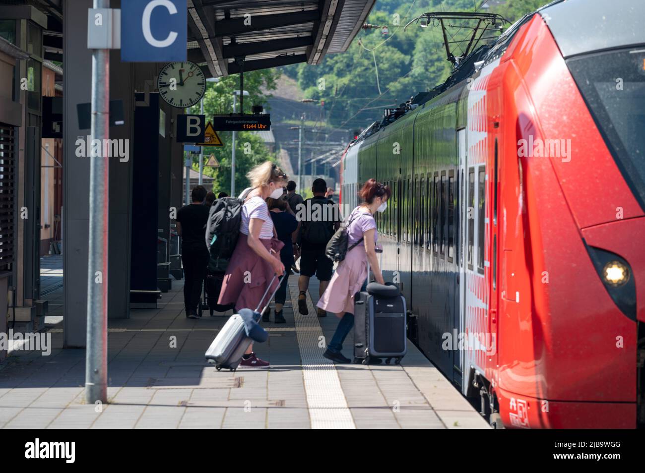 Cochem, Germany. 04th June, 2022. People walk to the regional train ...