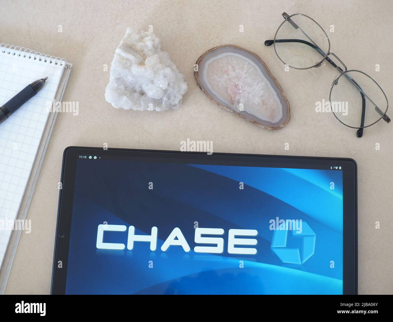 In this photo illustration Chase logo seen displayed on a tablet Stock ...
