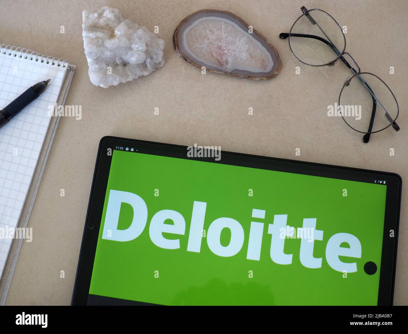 In this photo illustration Deloitte Touche Tohmatsu Limited logo seen ...