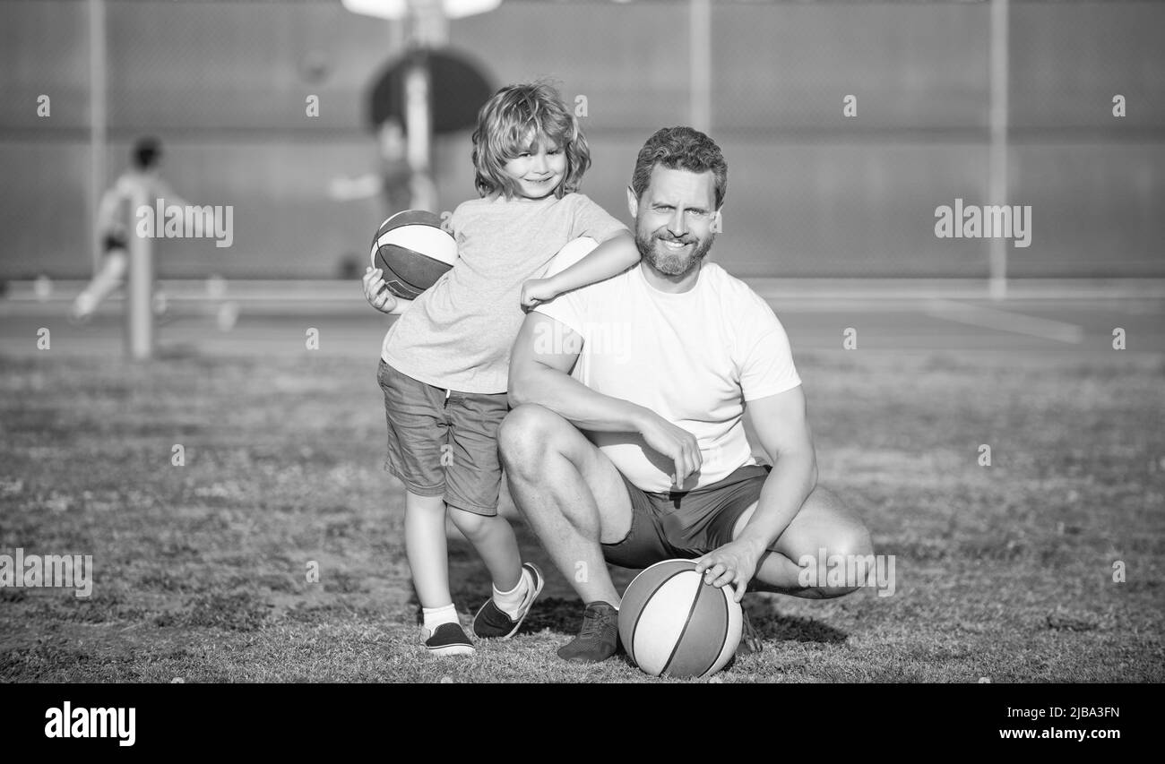 happy father and kid playing basketball with ball outdoor, sport Stock ...