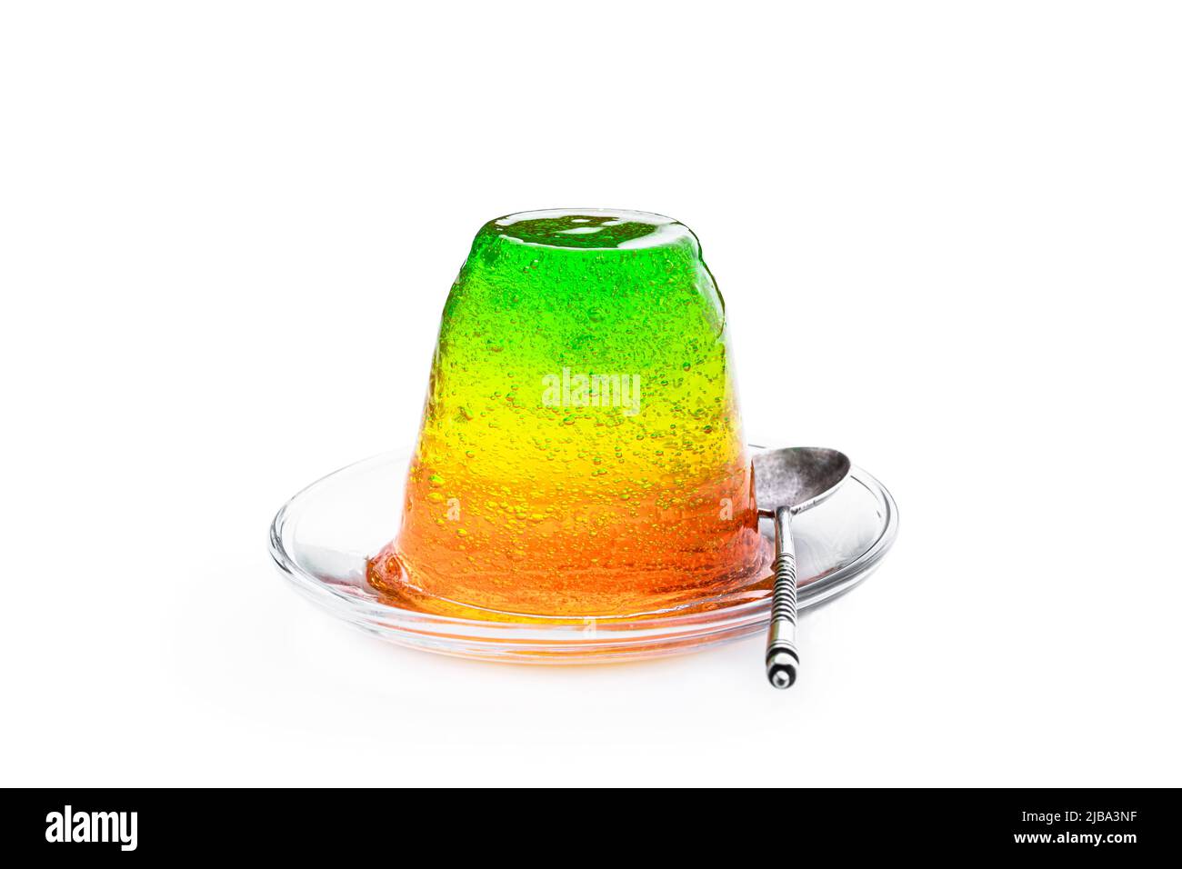 Rainbow fruit jelly isolated on white background Stock Photo - Alamy