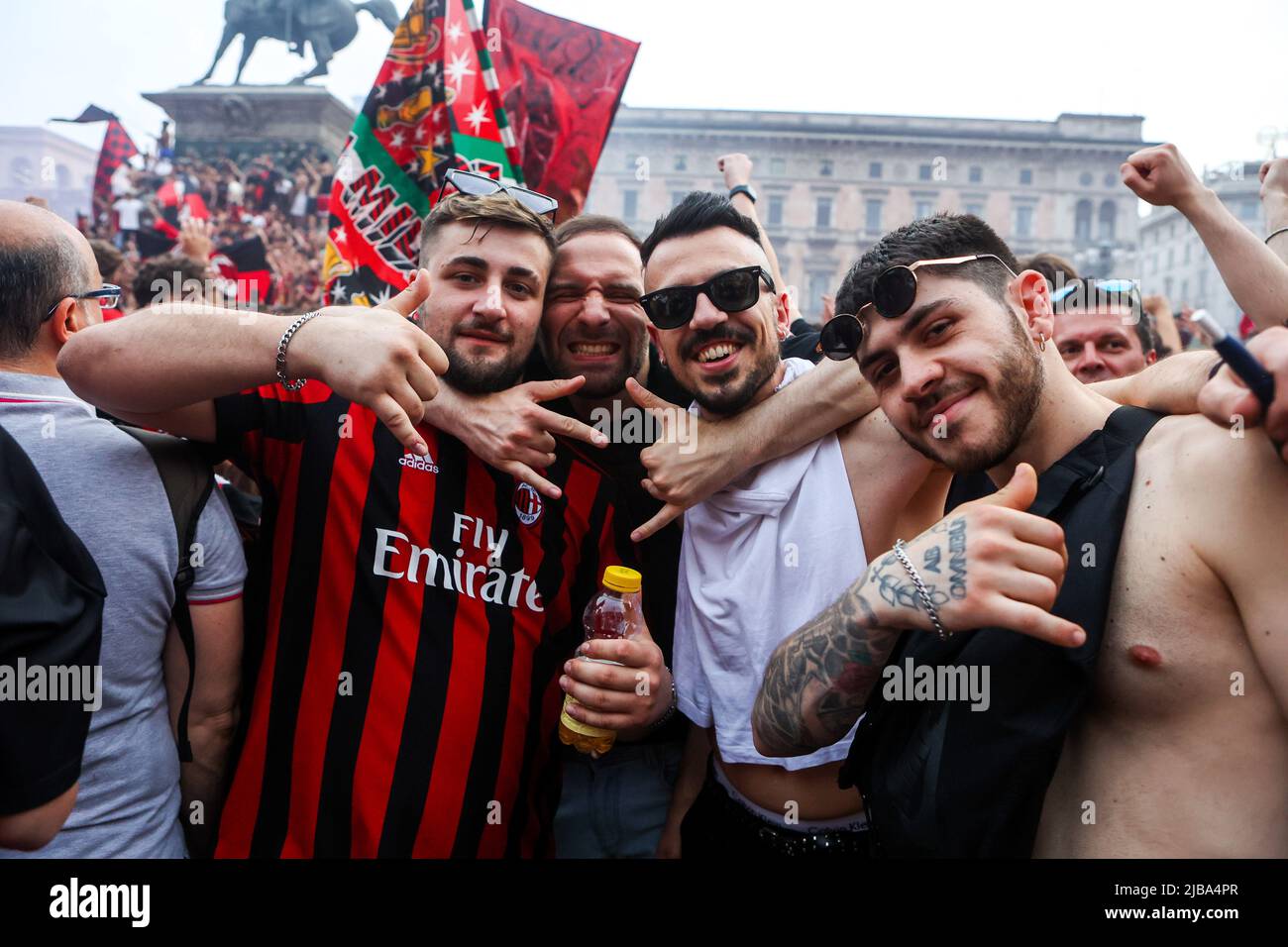 Milan fans celebrate in Piazza Duomo after winning Serie A and the ...