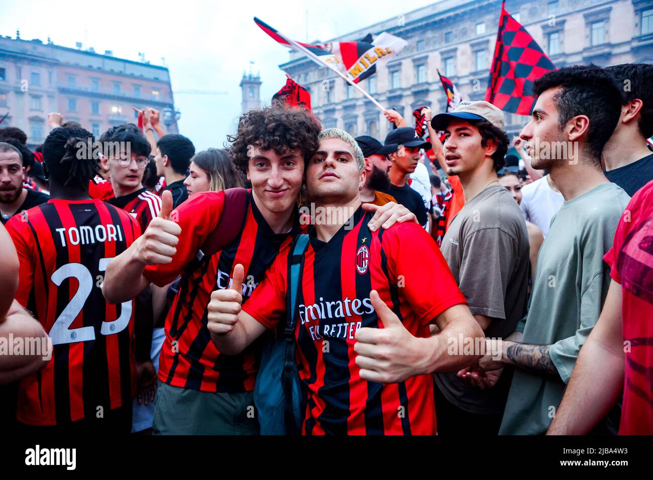 Milan fans celebrate in Piazza Duomo after winning Serie A and the ...