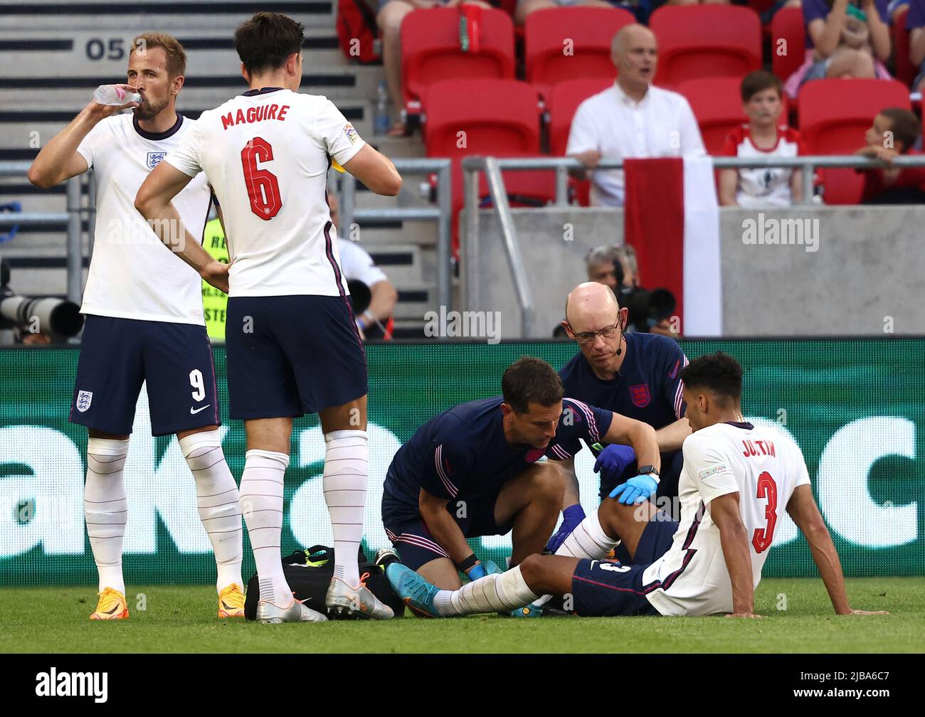 England's James Justin receives treatment for an injury during the UEFA ...