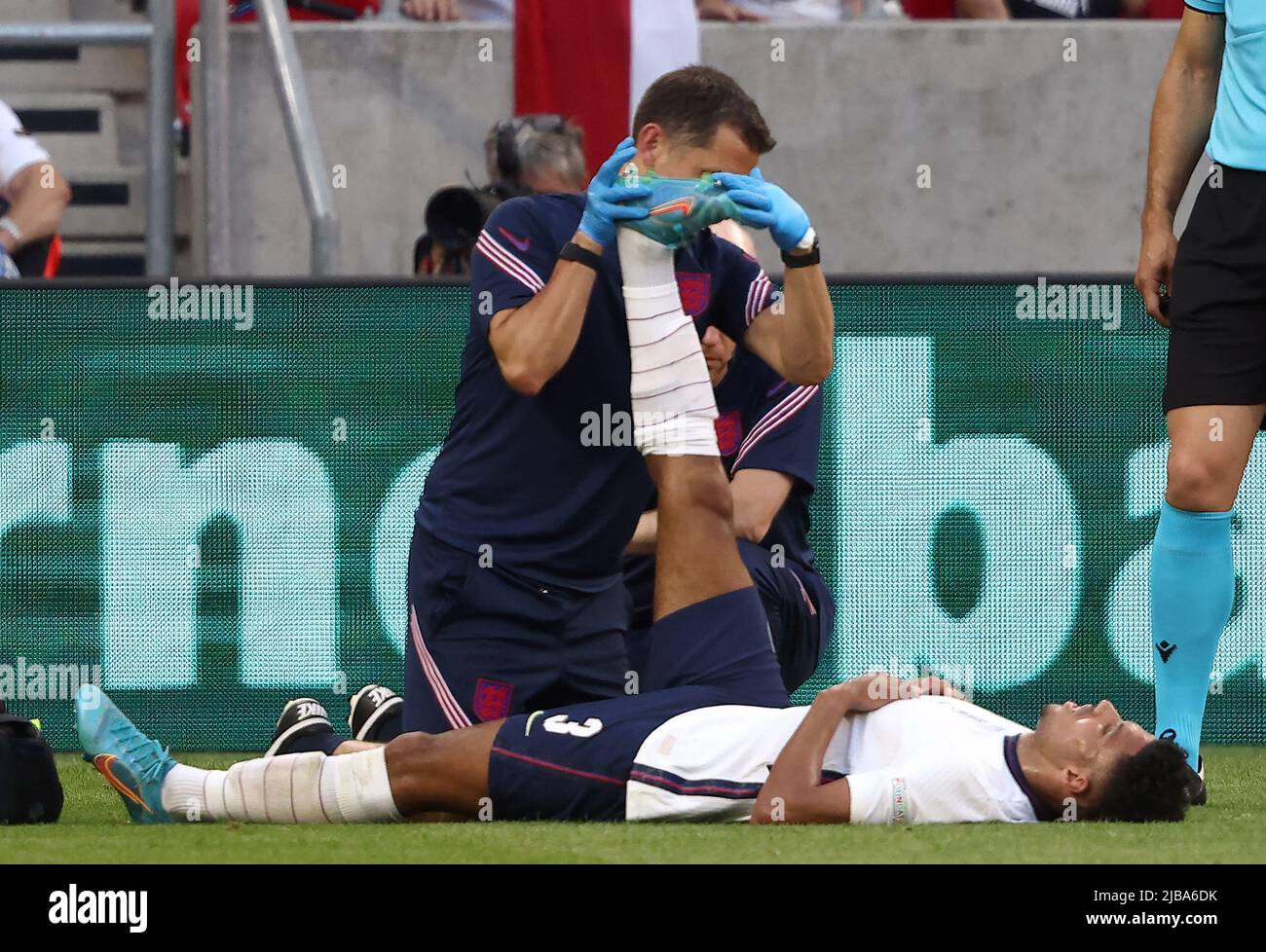 England's James Justin receives treatment for an injury during the UEFA ...