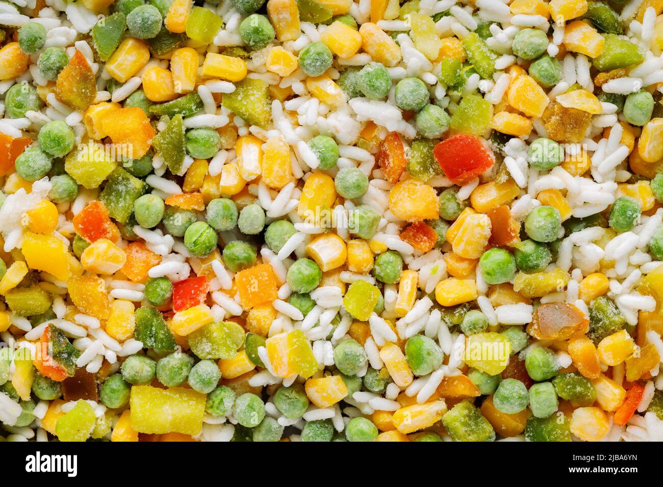 Food background with frozen vegetables with rice. Frozen vegetables ...