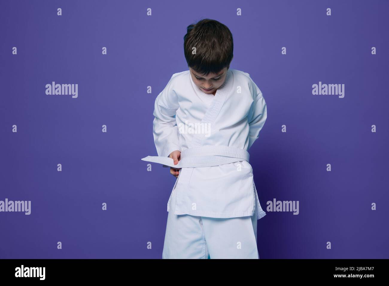 Horizontal portrait of a handsome confident European school age child ...