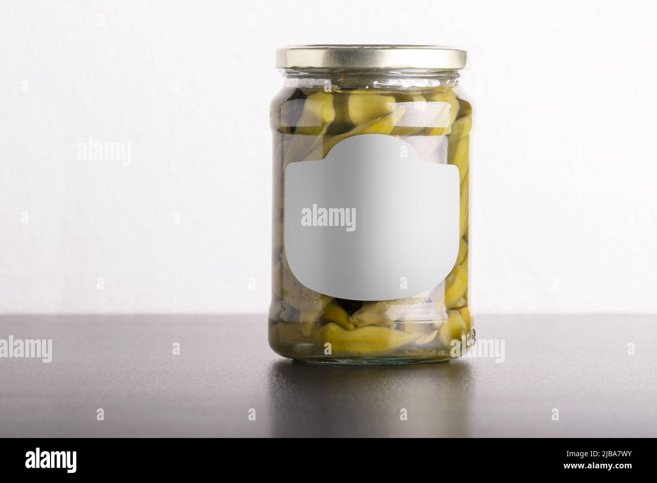 Pickled okra conserve glass with round cap, editable mock-up series ...