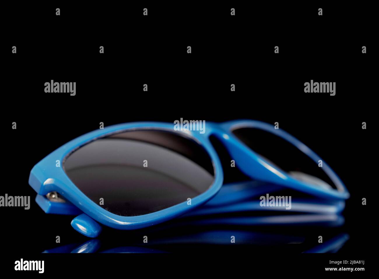 One glasses, close-up, isolated on a black background Stock Photo - Alamy