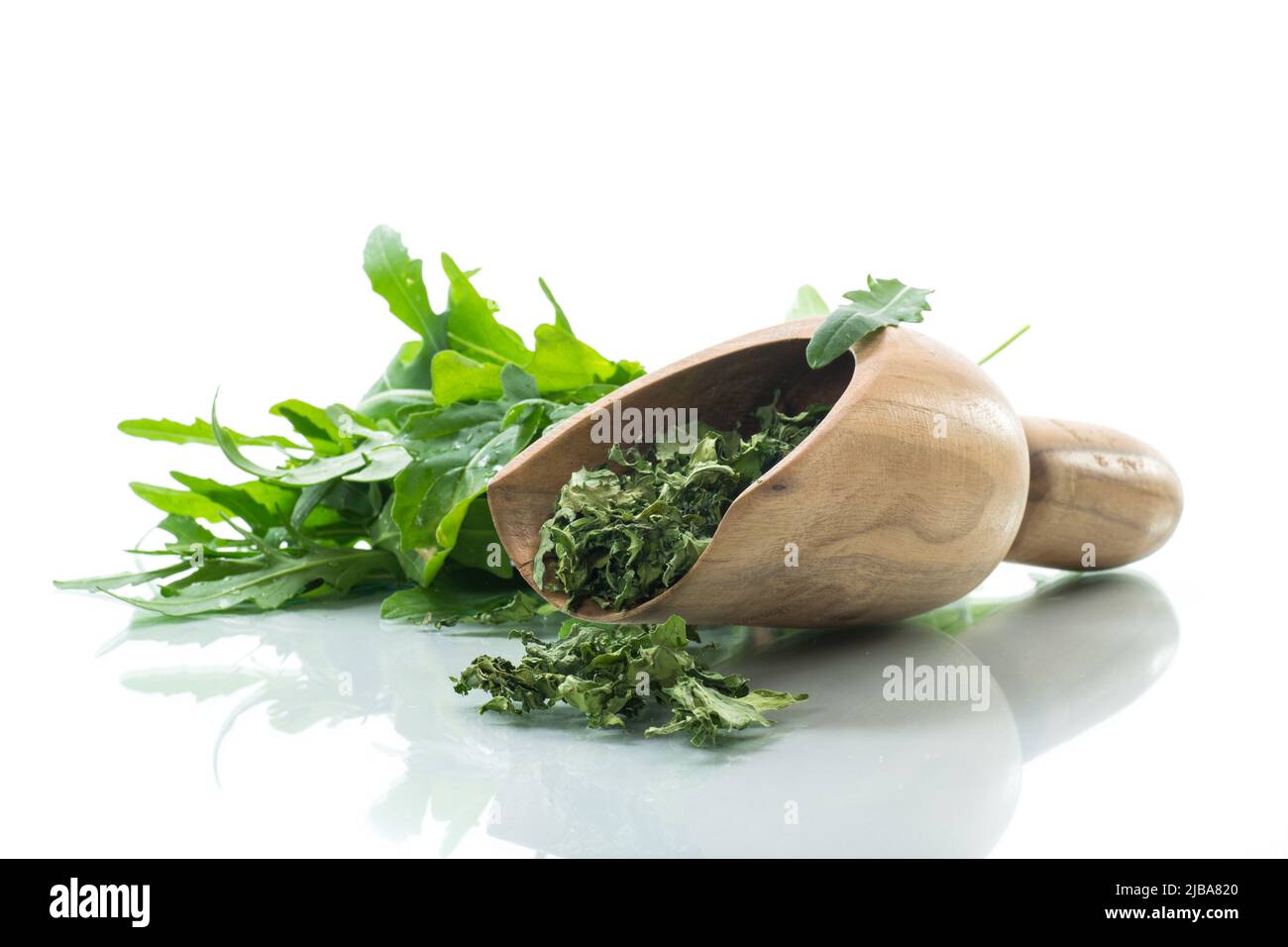 dried green organic arugula, seasoning, isolated on white background ...